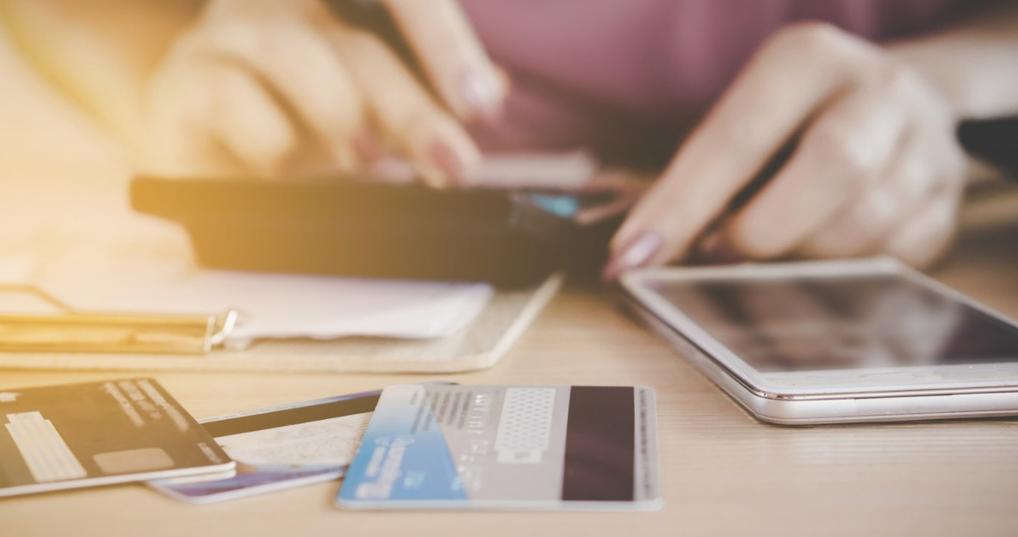 How to Refinance Credit Card Debt (and Pay It Off Faster) | FinanceBuzz